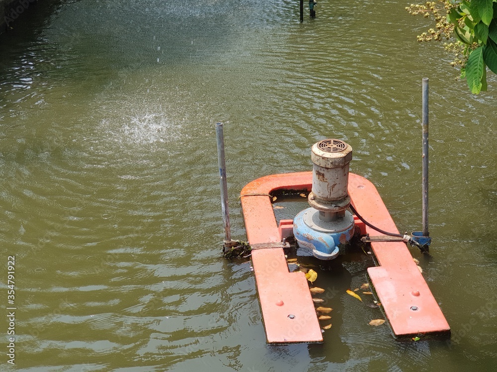 Mechanical compressed air and water suction aerator installed in public ...