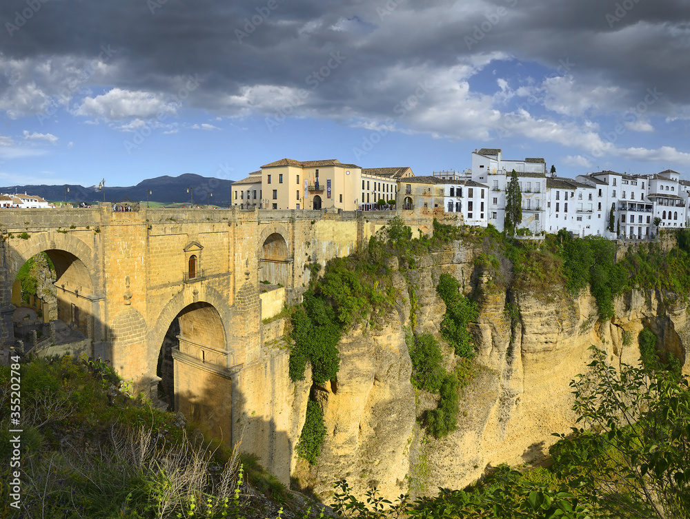 Ronda, Spain at the Puente Nuevo Bridge over the Tajo Gorge. Ronda is a ...