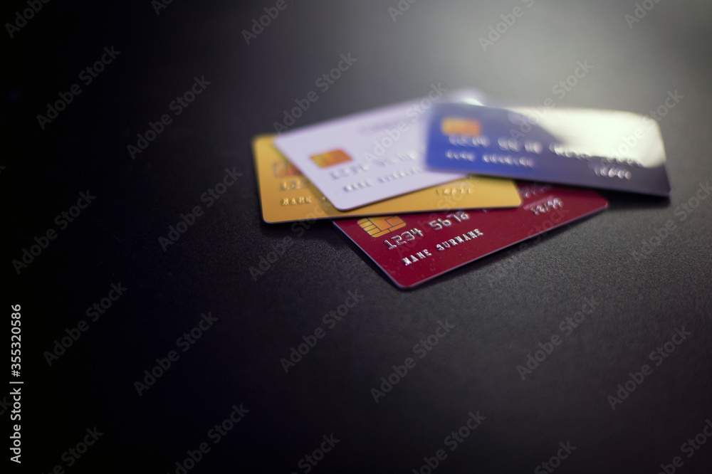 Focus and Close-up many credit cards, black screen background, Payment ...
