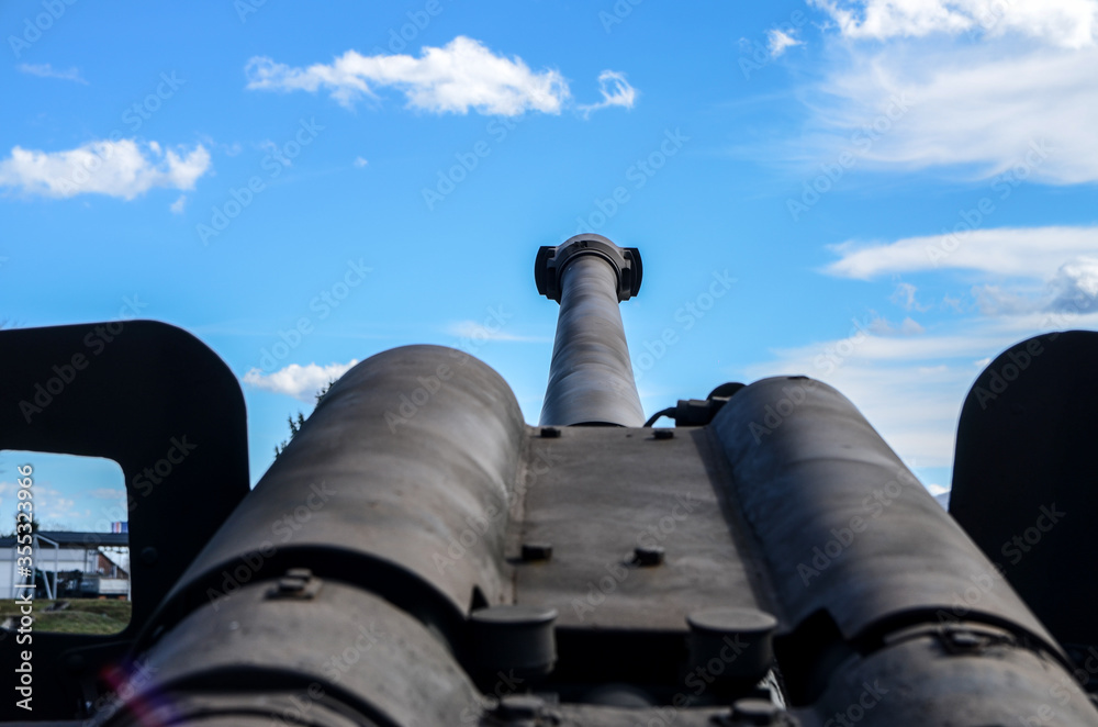 Large calibre field gun in firing position on battlefield. Howitzer gun ...