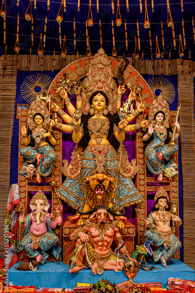 Idol of Goddess Devi Durga at a decorated puja pandal in Kolkata, West ...