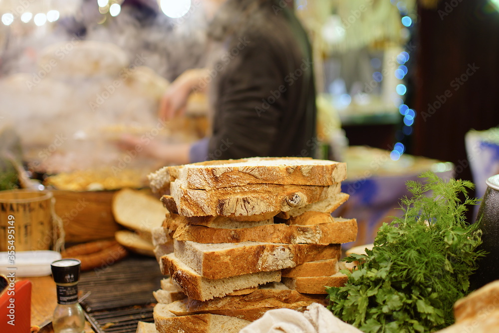 Traditional Polish country bread with lard or garlic butter at a ...