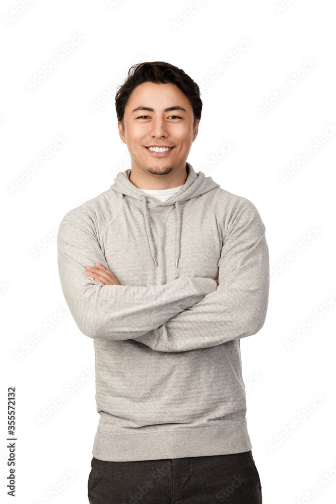 A young Asian millennial feeling assertive flashing an awesome smile ...