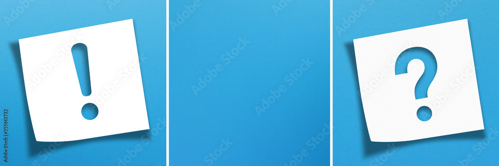 Note paper with exclamation mark and question mark on panoramic blue ...