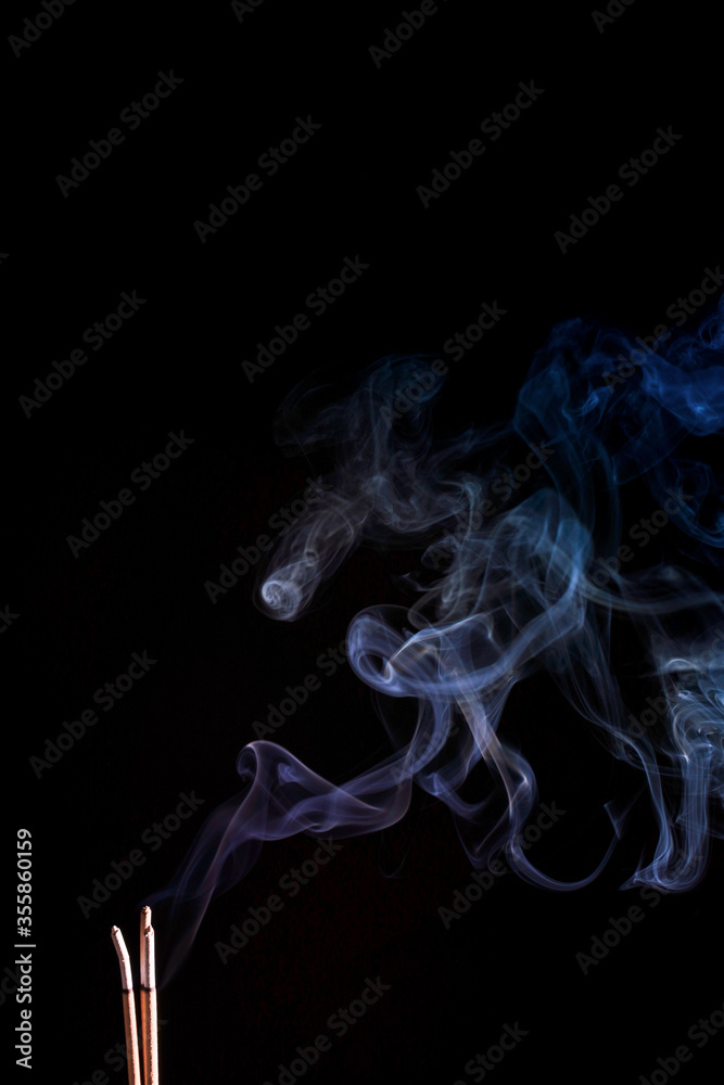 Smoke incense wallpaper in color on black background. Smokey smooth and ...