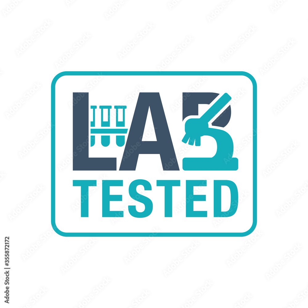Lab tested sign - laboratory equipment (testing flasks and microscope ...