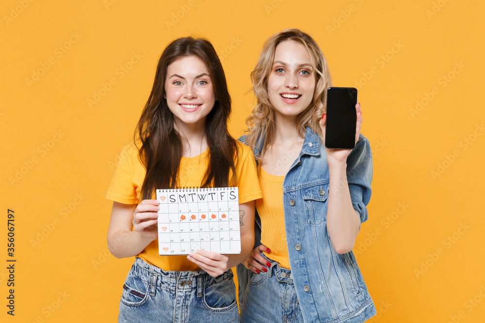 Smiling women girls friends isolated on yellow background. Medical ...