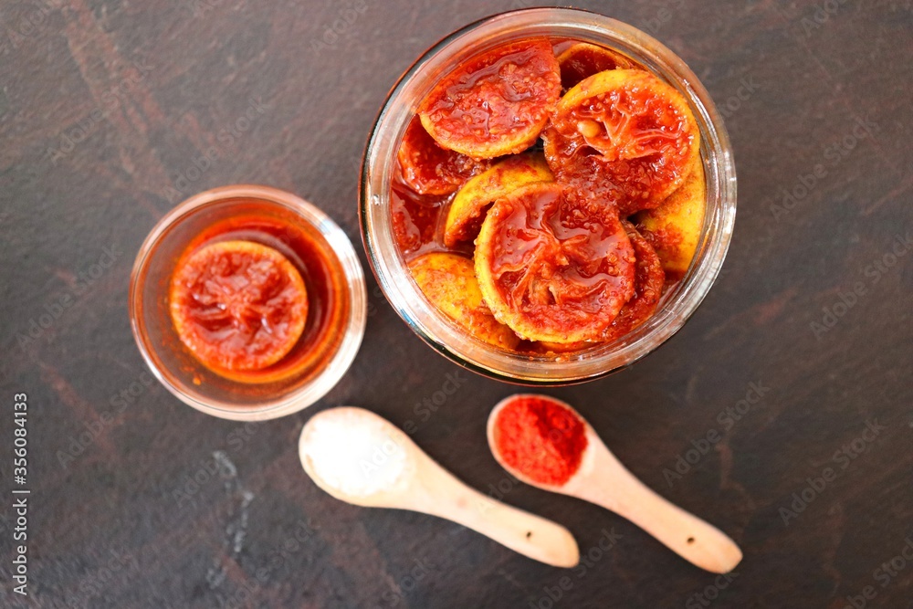 Indian traditional homemeade sweet, tangy and spicy lemon pickle or ...