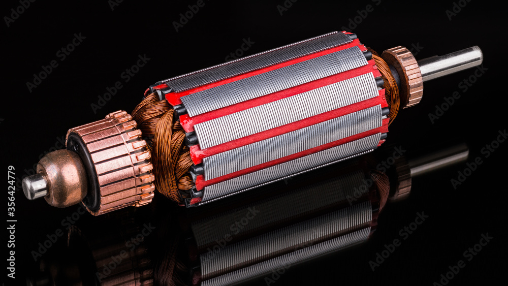 Inside of DC motor rotor with reflection on black background. Artistic ...