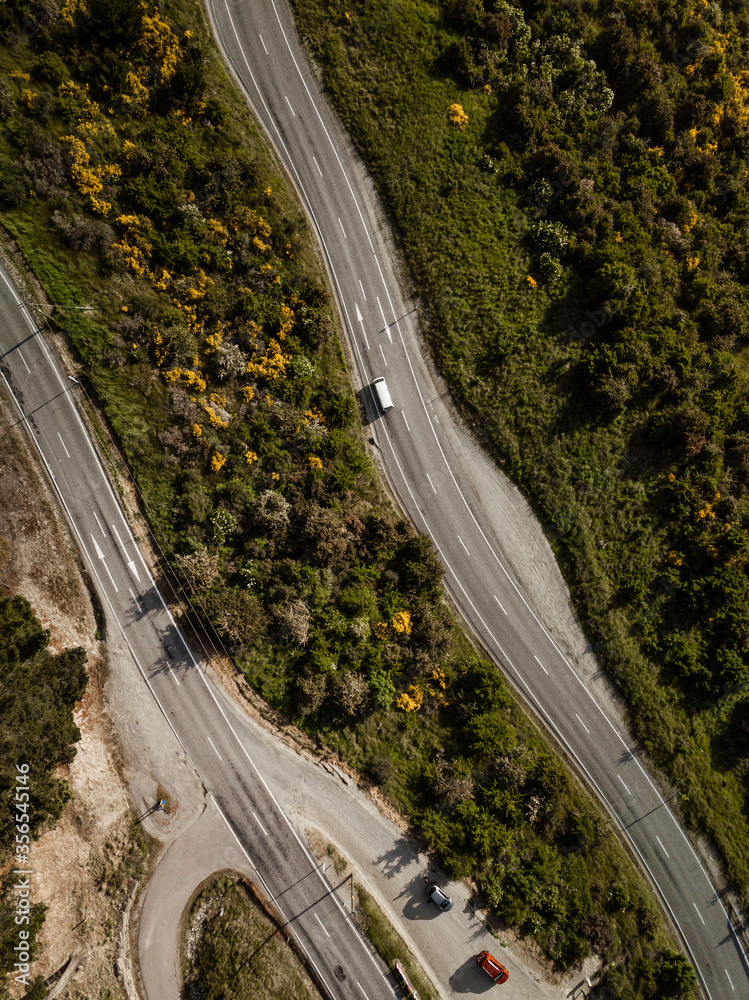 Aerial photos around Crown Range winding road taken in the afternoon ...