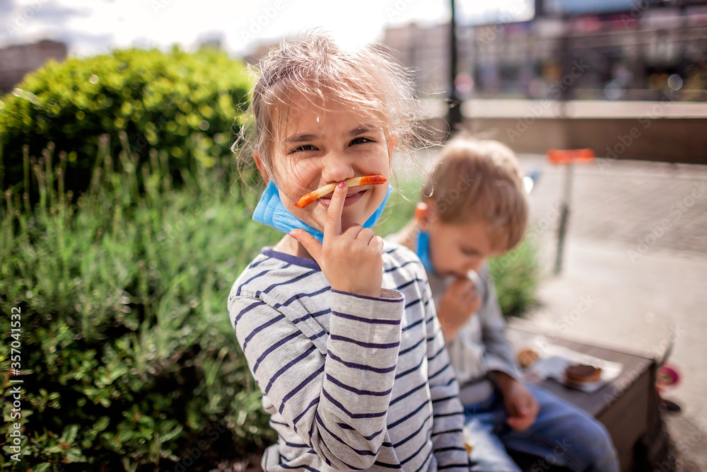 New normal reality, stay safe in street cafe, father with kids in ...