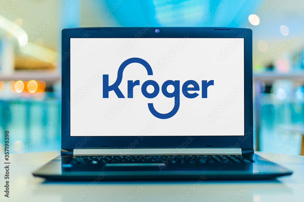 Laptop computer displaying logo of Kroger Stock Photo | Adobe Stock