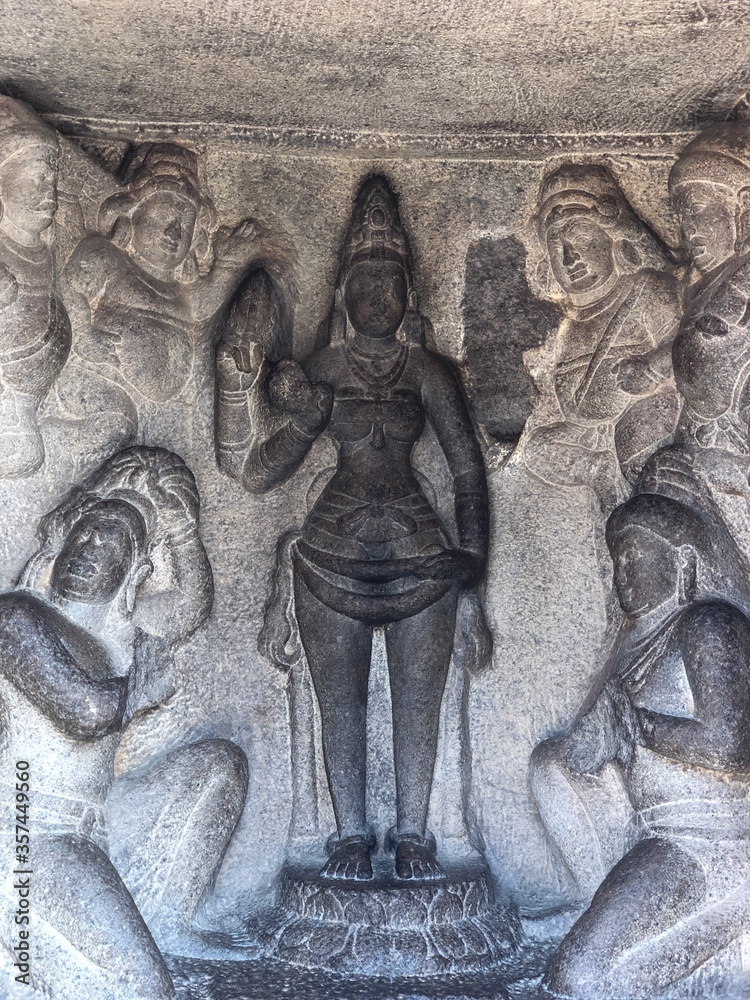 Bas relief rock cut sculptures of gods, people and animals are carved prominently in the ...