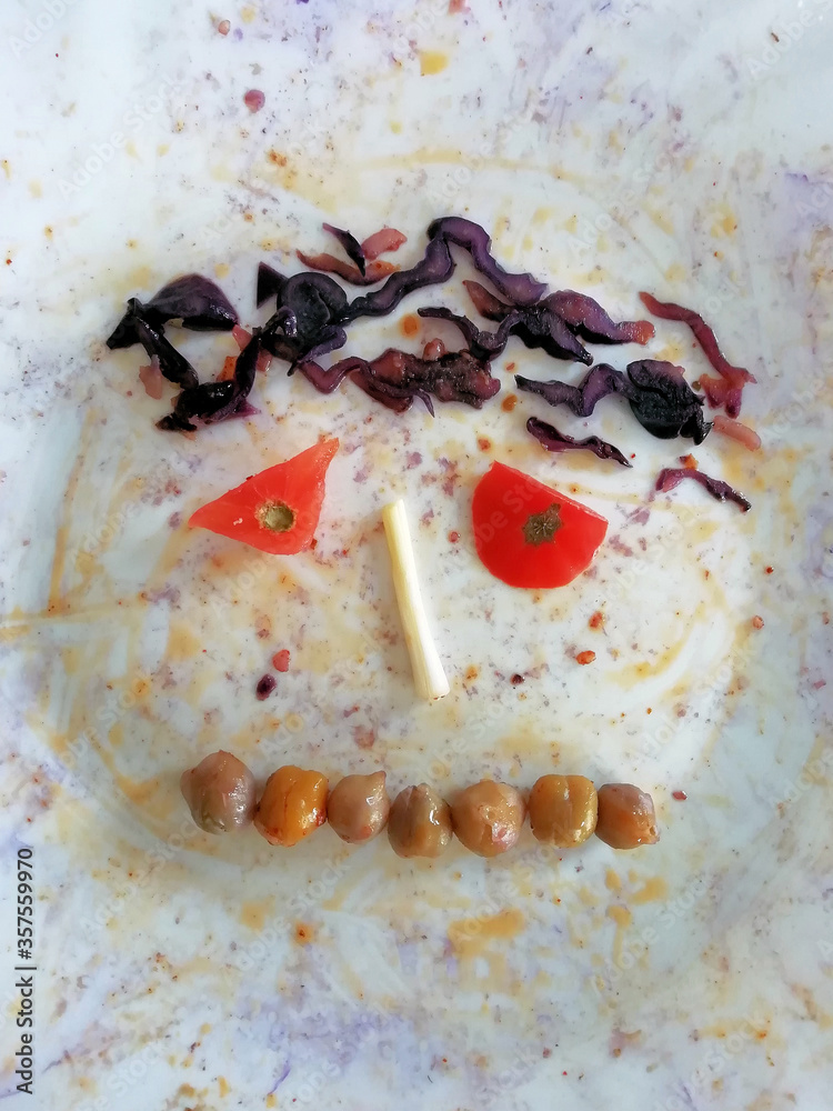 Sad face - Food Art. A face drawn with vegetables pieces. Still-Life ...