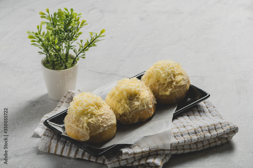 Buttery and Cheesy Ensaymada ( Bun topped with Butter Sugar and Cheese ...
