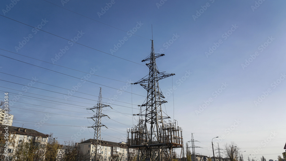 High voltage pole with wires through which electricity flows. Power ...