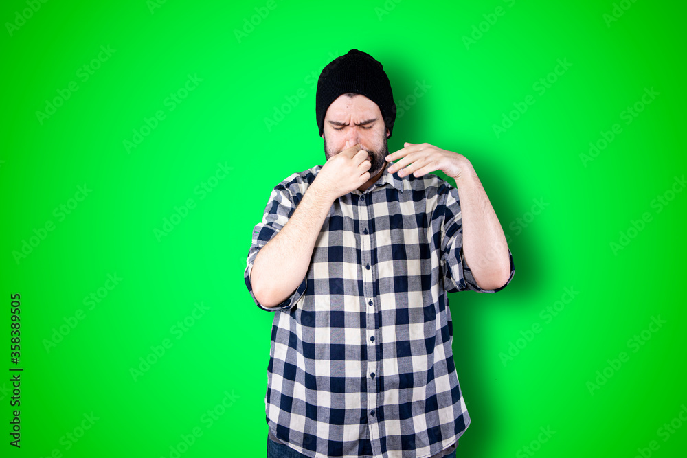 Bearded man with disgusted expression repulsing something. Disgust ...