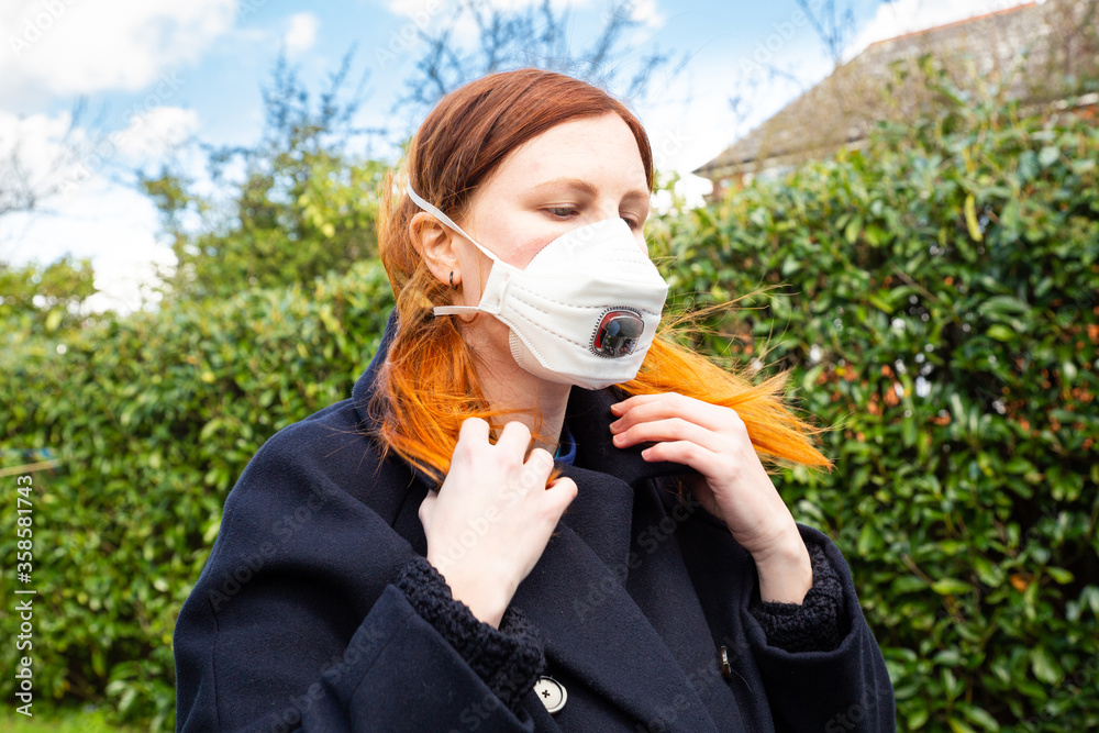 Beautiful woman wearing respiratory mask for the new rapidly spreading ...