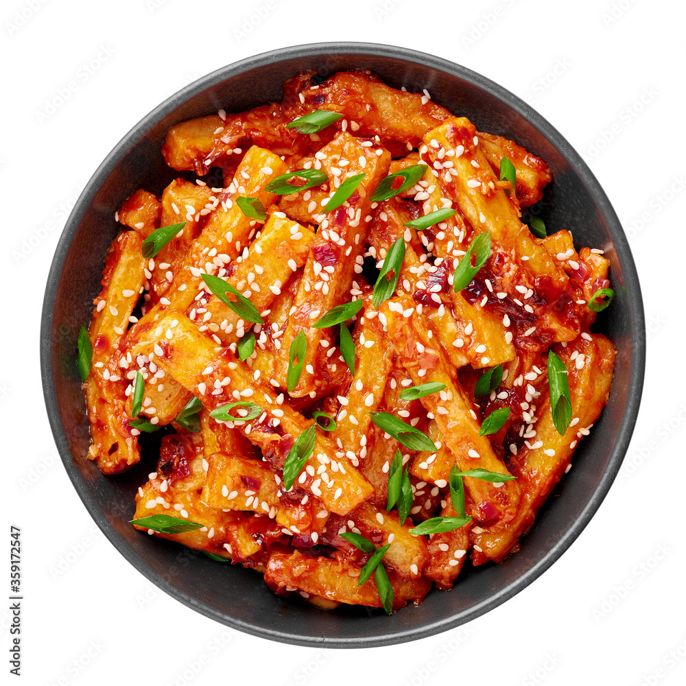 Honey Chilli Potato or Schezwan Aloo in black bowl isolated on white ...
