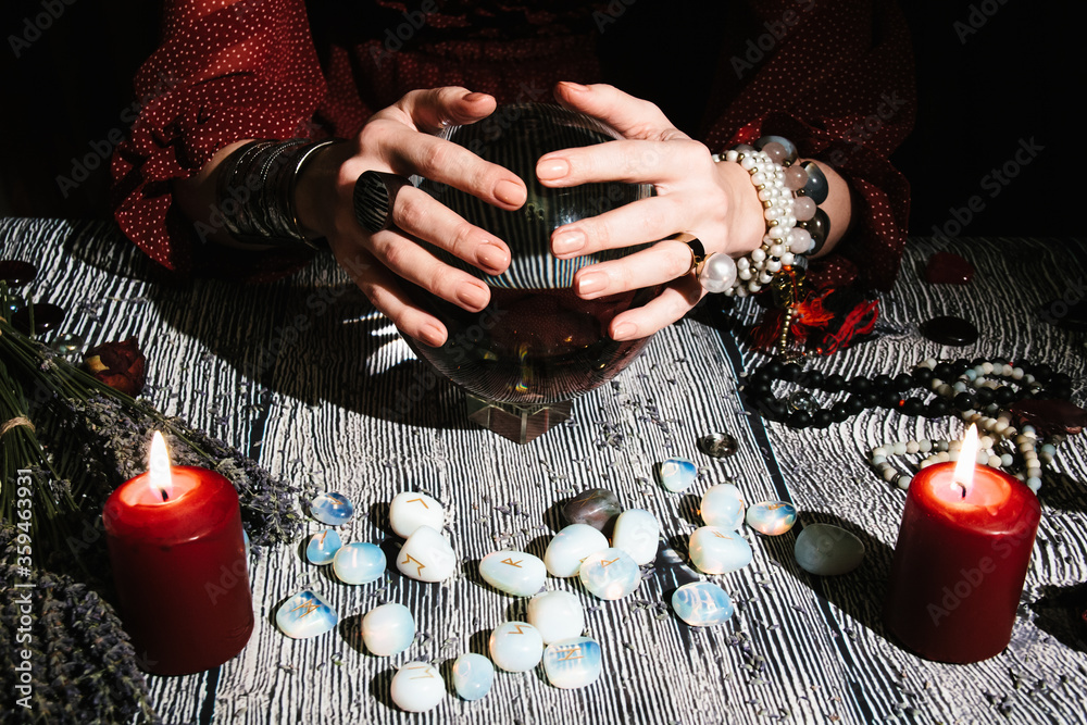 Fortuneteller's hands on a glass orb. Prediction of the future. Mystic ...