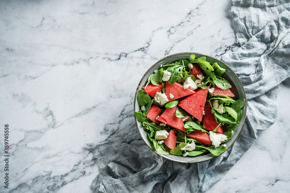 Fresh summer watermelon salad with feta cheese, arugula, spinach and ...