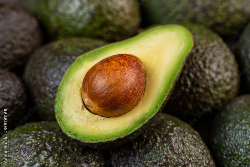 half avocado on avocados Stock Photo | Adobe Stock