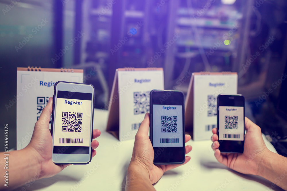 Many of people holdind and using smartphone to scan QR code for ...