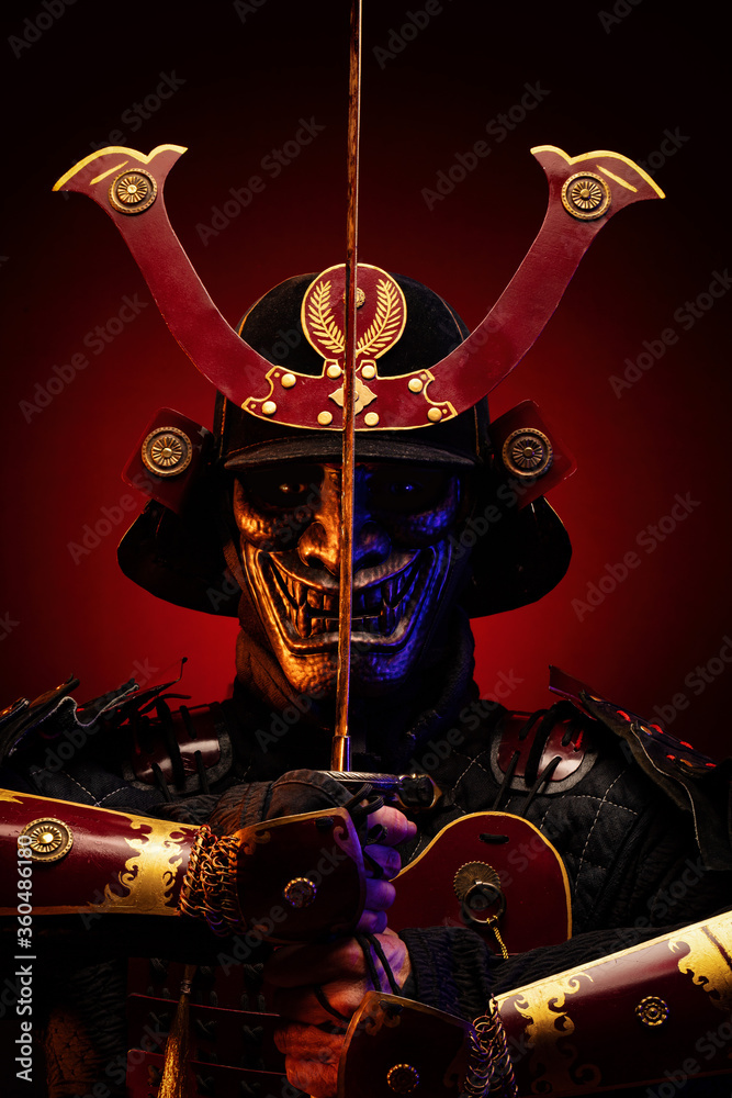 Portrait of a samurai in red armor on guard Stock Photo | Adobe Stock