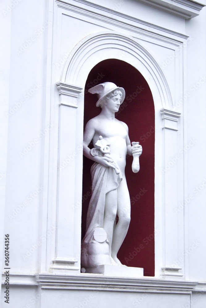 Ancient statue of antique god of commerce, merchants and travelers ...