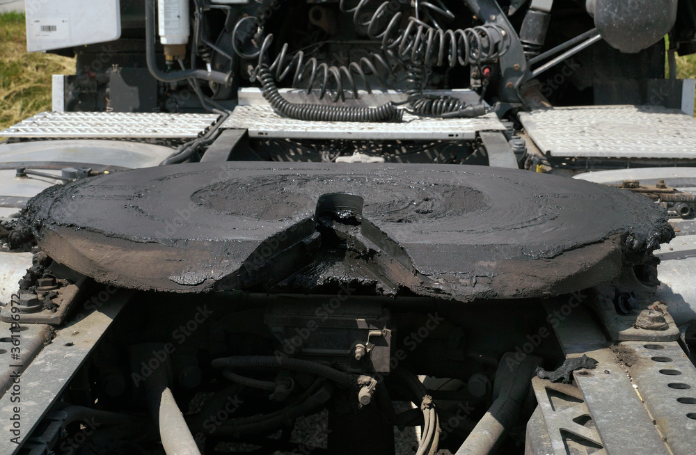 Rear of the tractor unit. Visible fifth wheel couplings are fitted to a ...