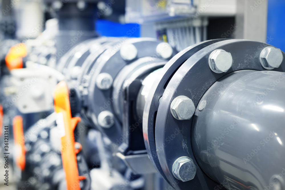 PVC pipeline an industrial city water treatment boiler room. Valves and ...