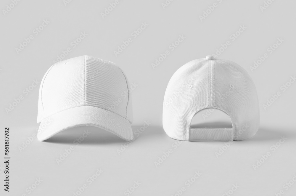 White baseball caps mockup on a grey background, front and back side ...