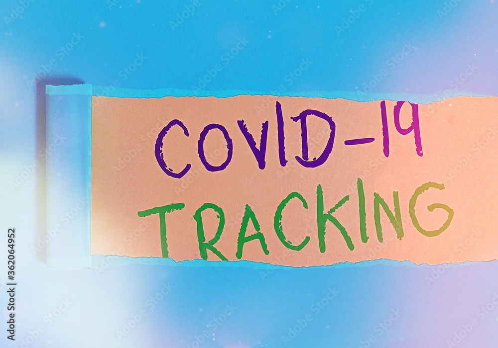 Handwriting text writing Covid 19 Tracking. Conceptual photo ...