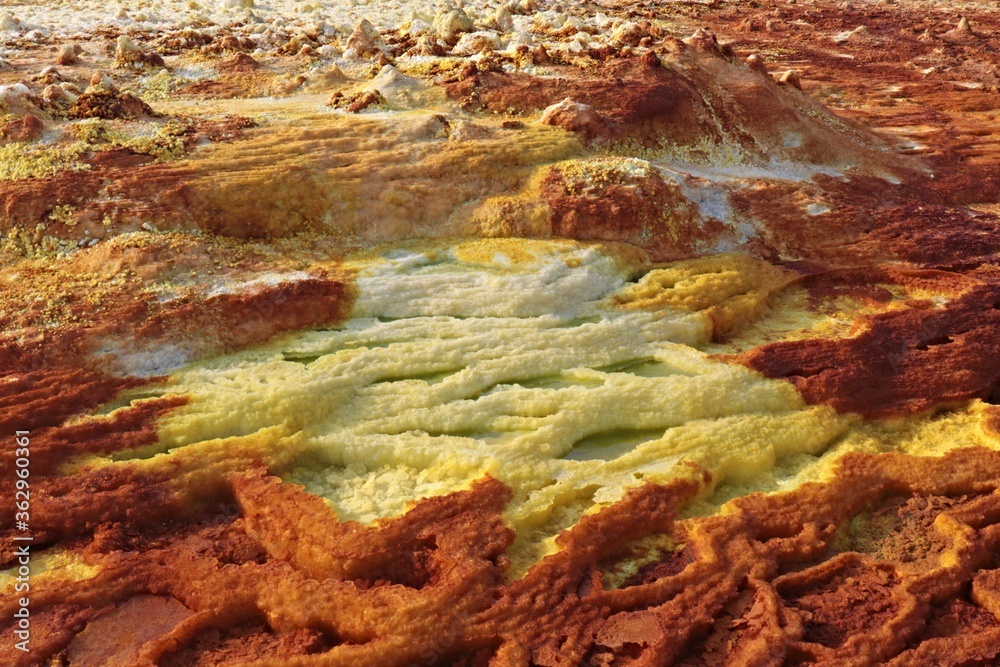 Salt ponds, bubbling chimneys and salt terraces form the bottom of the ...