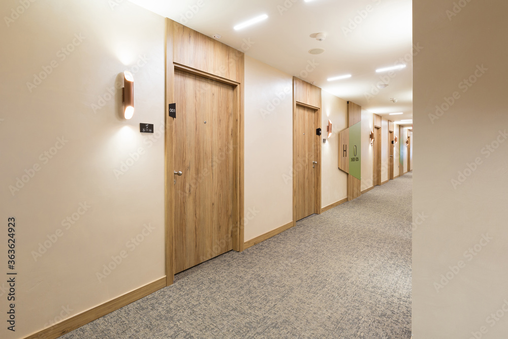 Interior of a long hotel corridor doorway Stock Photo | Adobe Stock