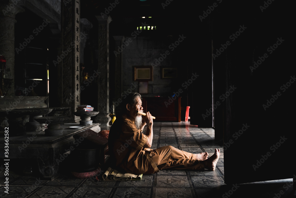 Monk Inside A Temple In Vietnam Stock Photo | Adobe Stock