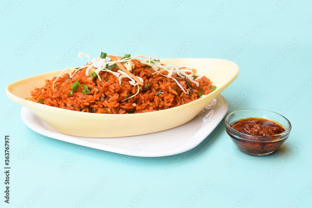Schezwan fried rice with schezwan sauce, Chinese fried rice,garnished ...