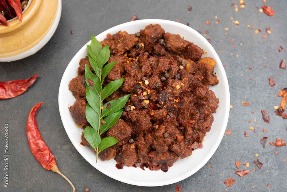 Beef fry curry roast mutton curry meat dish Kerala, India. Hot and ...