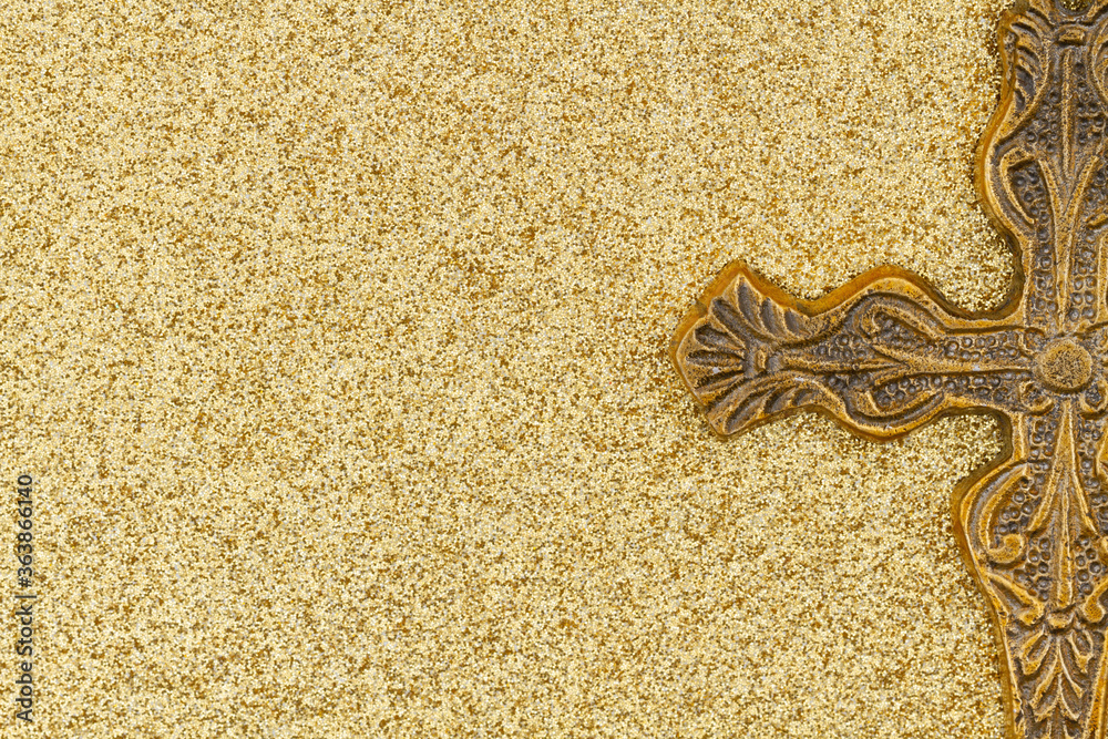 Bronze retro cross on gold glitter background Stock Photo | Adobe Stock