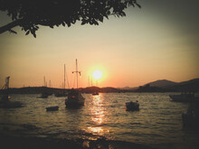 Yellow Sunset With Boats Free Stock Photo - Public Domain Pictures