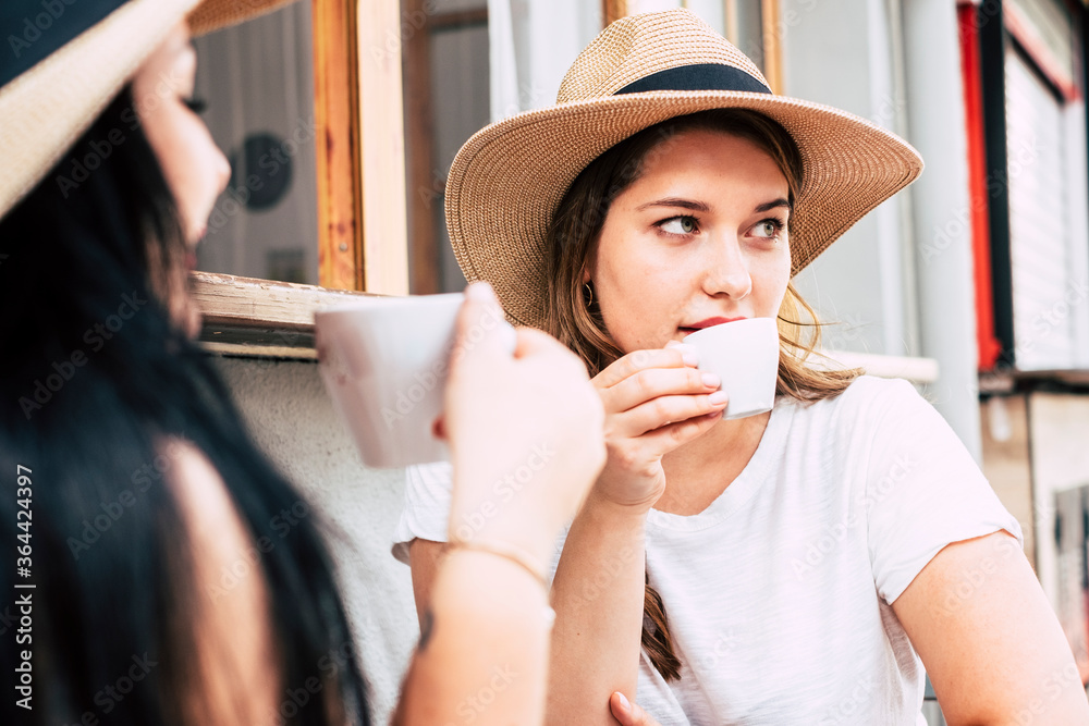 Beautiful caucasian model drink coffee at the bar with friend viewed ...