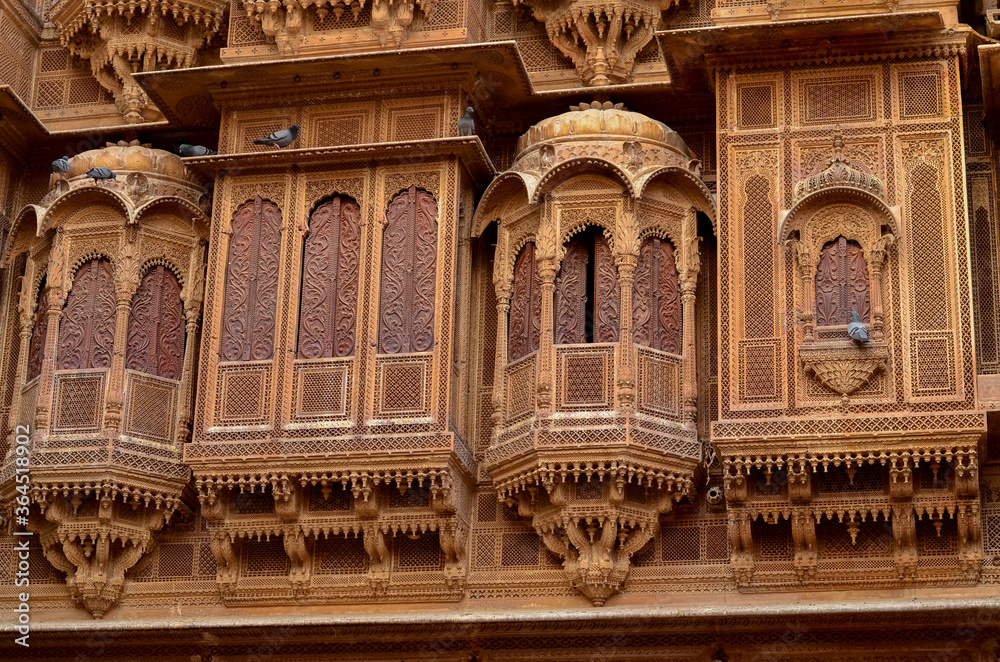 Traditional Rajasthani haveli with a decorated window at Patwon ki ...