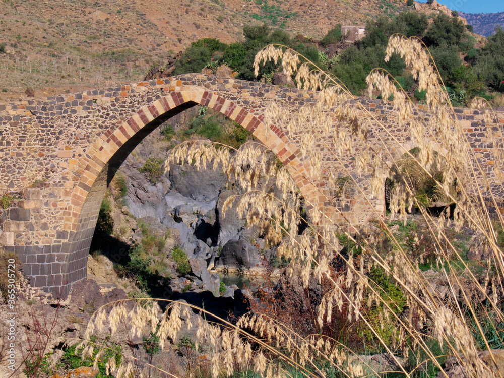 Arabic Arch Of A Bridge Over The River Simeto, An Example Of Ancient ...