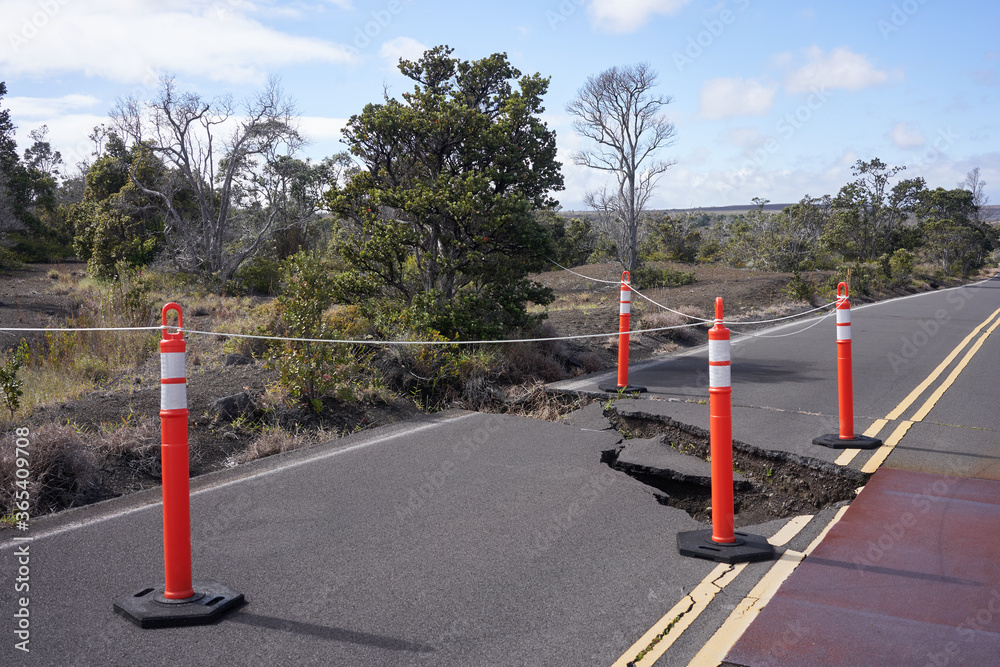 Asphalt road damaged by the volcanic eruption of Kīlauea and caldera ...