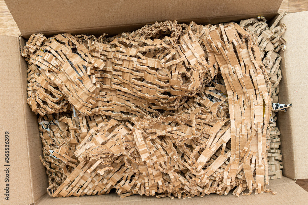 shredded, cut paper, carton for recycling inside a cardboard box ...