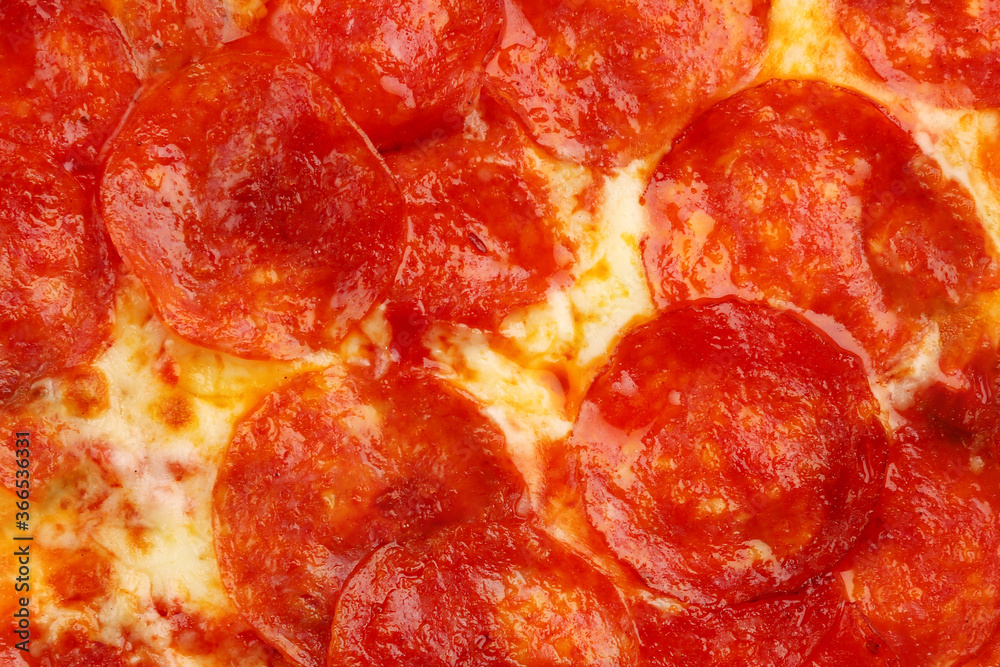 pepperoni pizza texture closeup with basil top view. pizza background ...