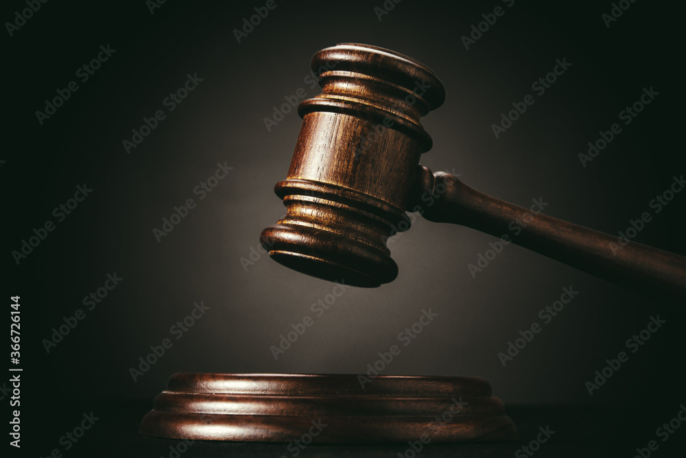 Judge (auction) gavel on a black background Stock Photo | Adobe Stock