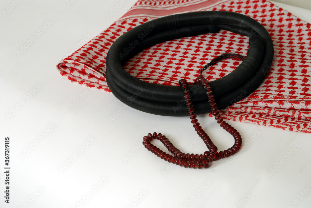 A set of arabic cultural,traditional male clothing accessories,double ...
