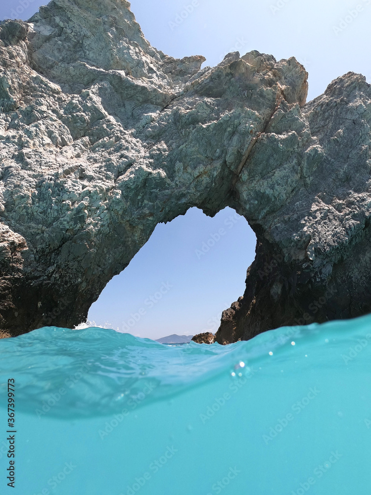 Sea level and underwater ultra wide photo of Lalaria beach, one of the ...