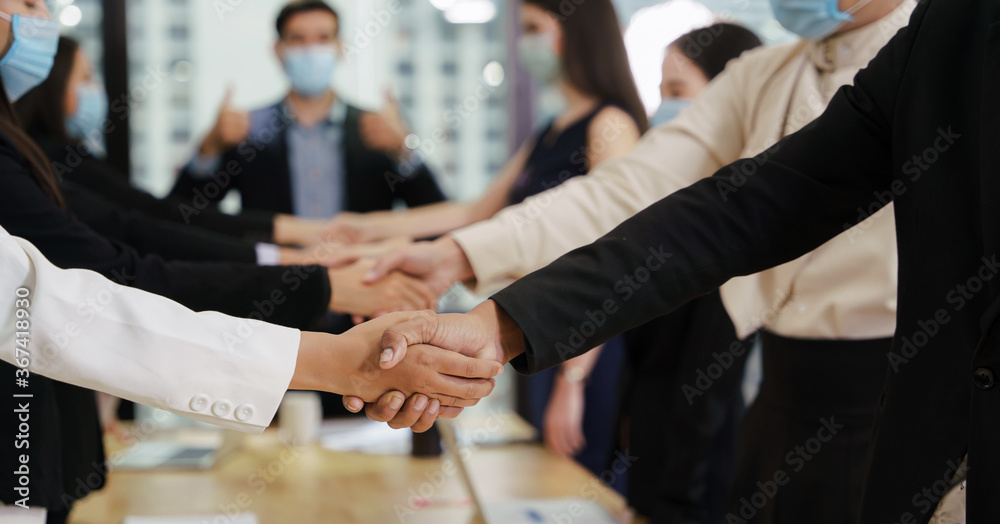 business team show teamwork with having handshake together Stock Photo ...